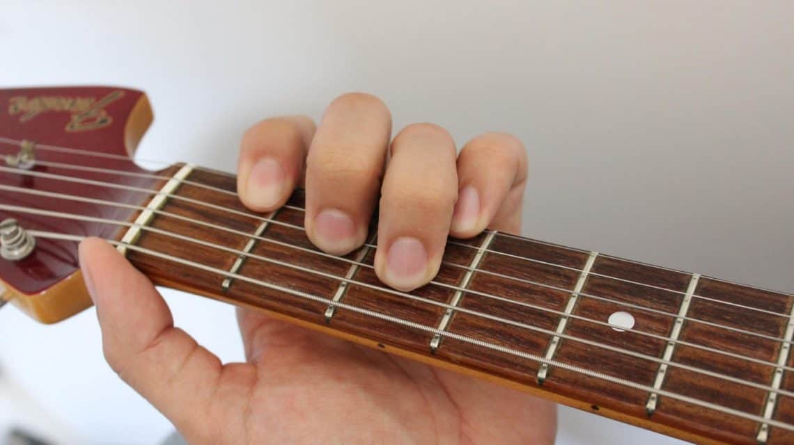 How to Train Your Little Finger for Guitar - Beginner Guitar HQ