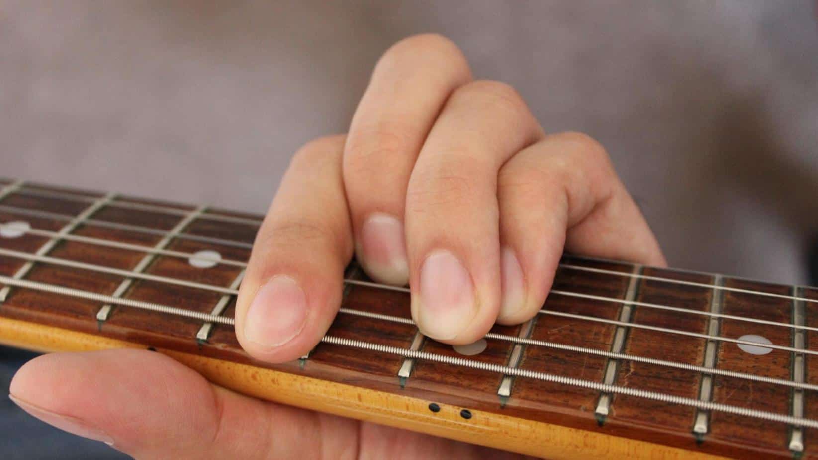 How to Train Your Little Finger for Guitar - Beginner Guitar HQ